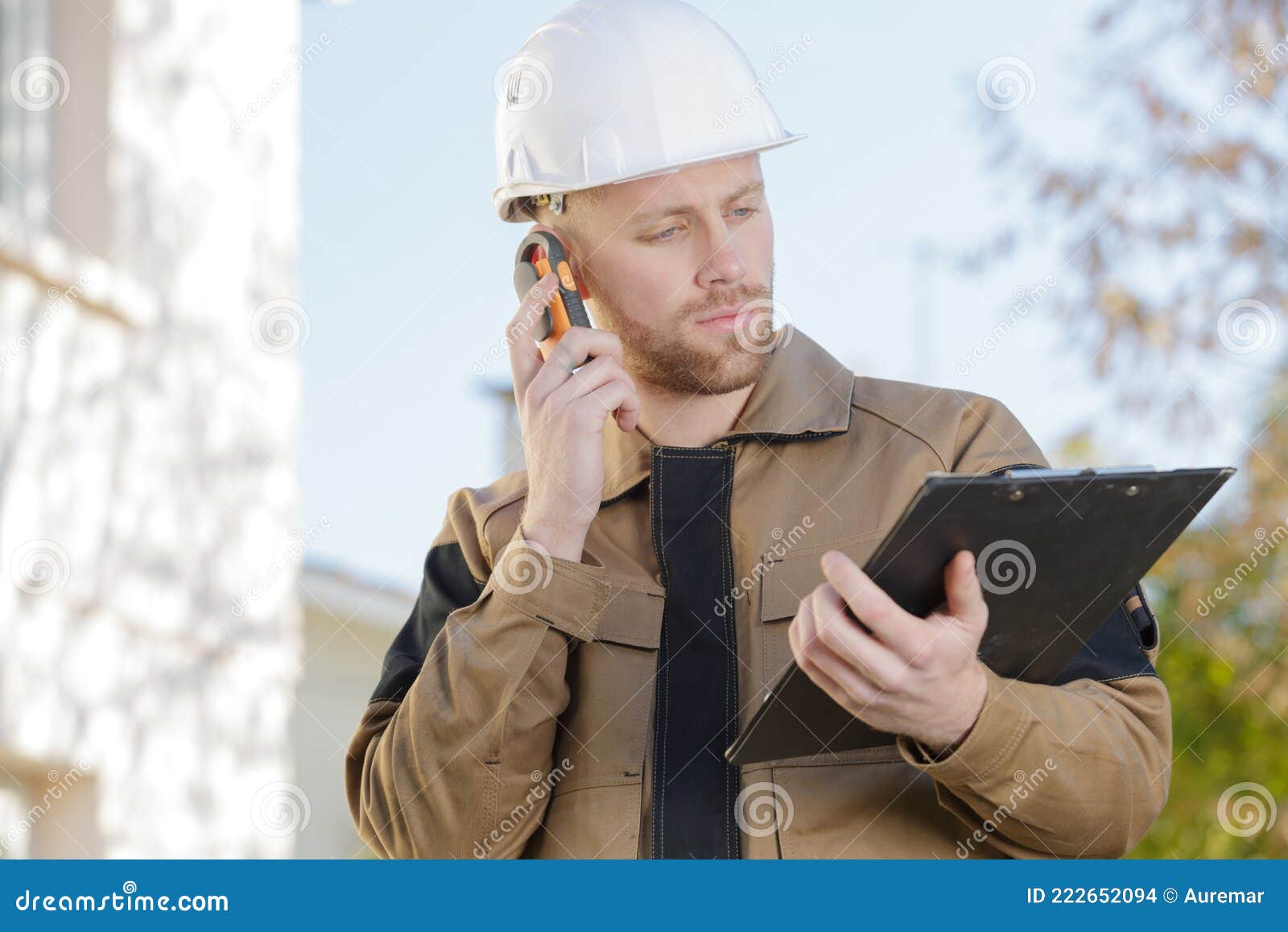 Architect on Building Site Using Mobile Phone Stock Photo - Image of ...
