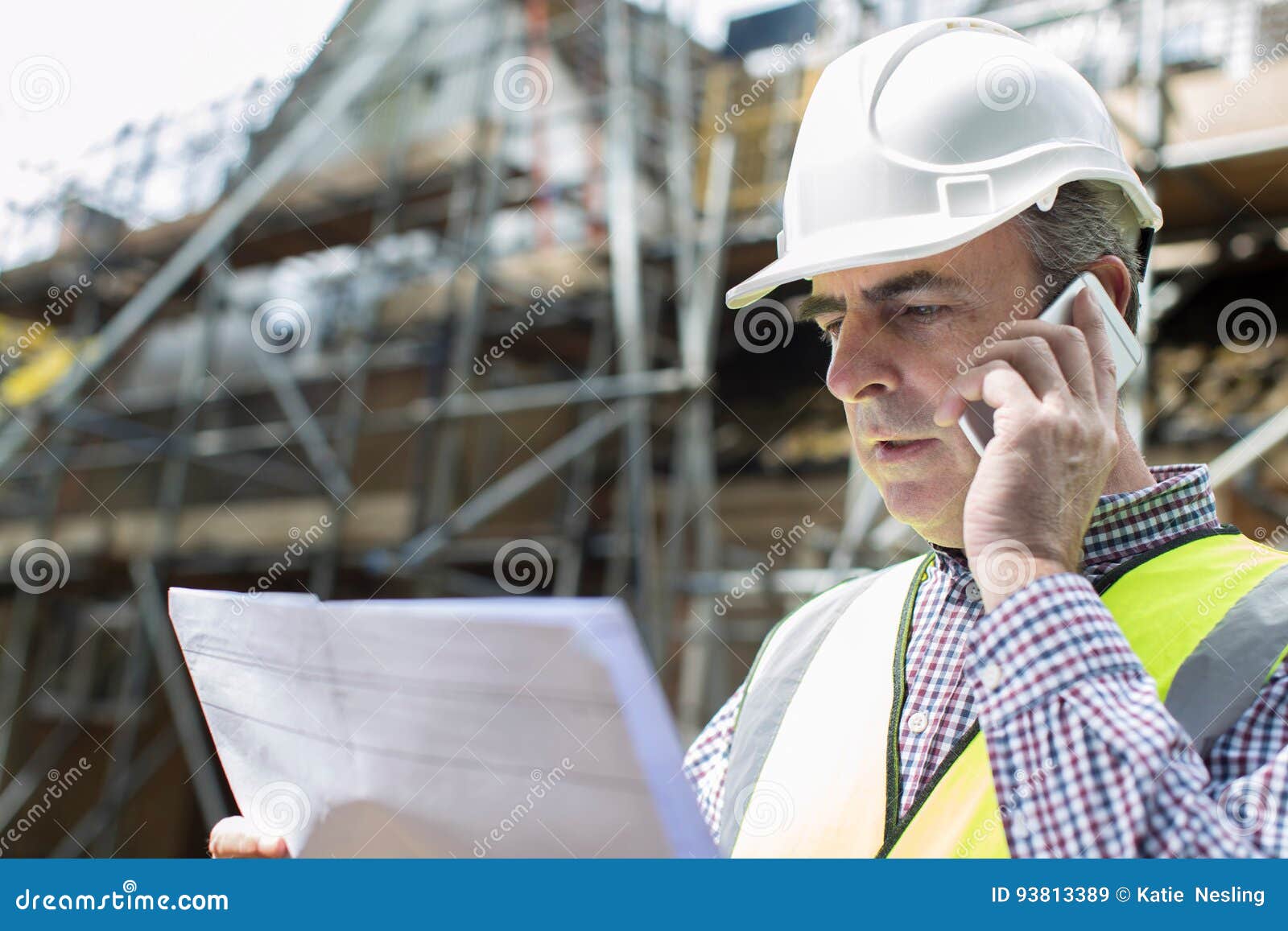 Architect on Building Site Using Mobile Phone Stock Image - Image of ...