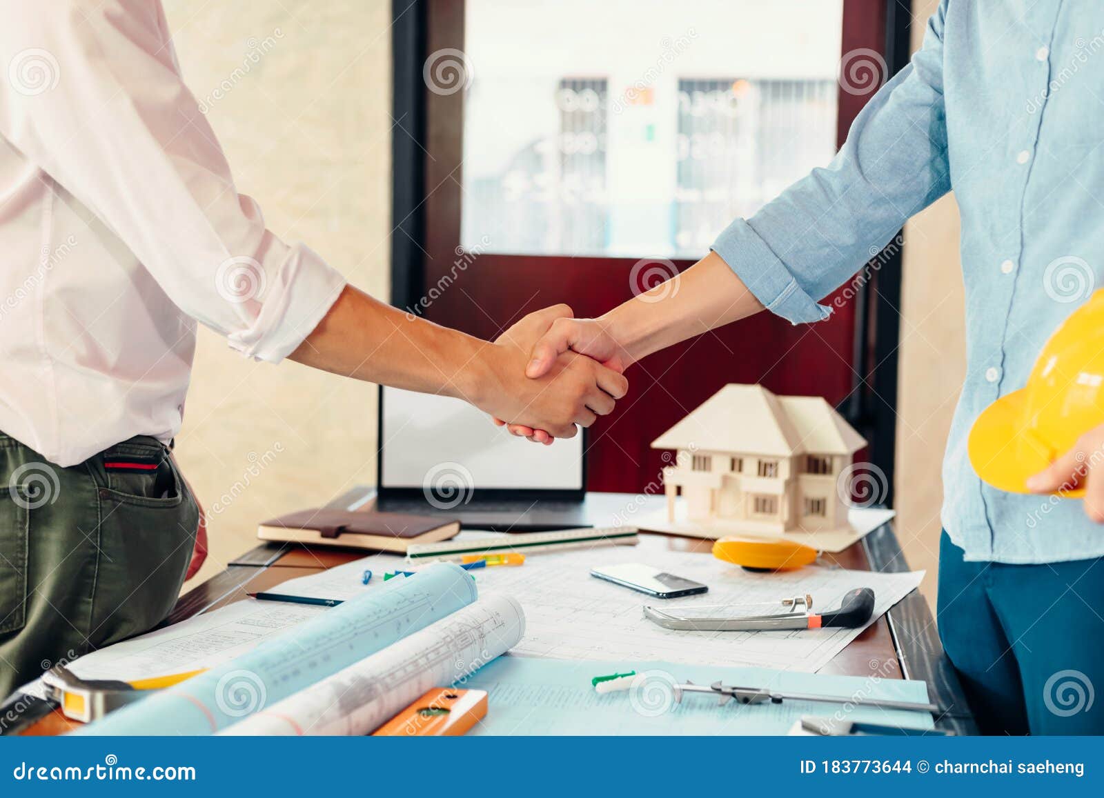 Architect and Businessman Handshake after Finish an Agreement in the ...