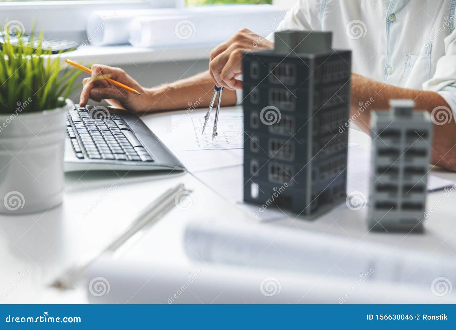 Architect or Civil Engineer Working in Office with Blueprints Stock ...