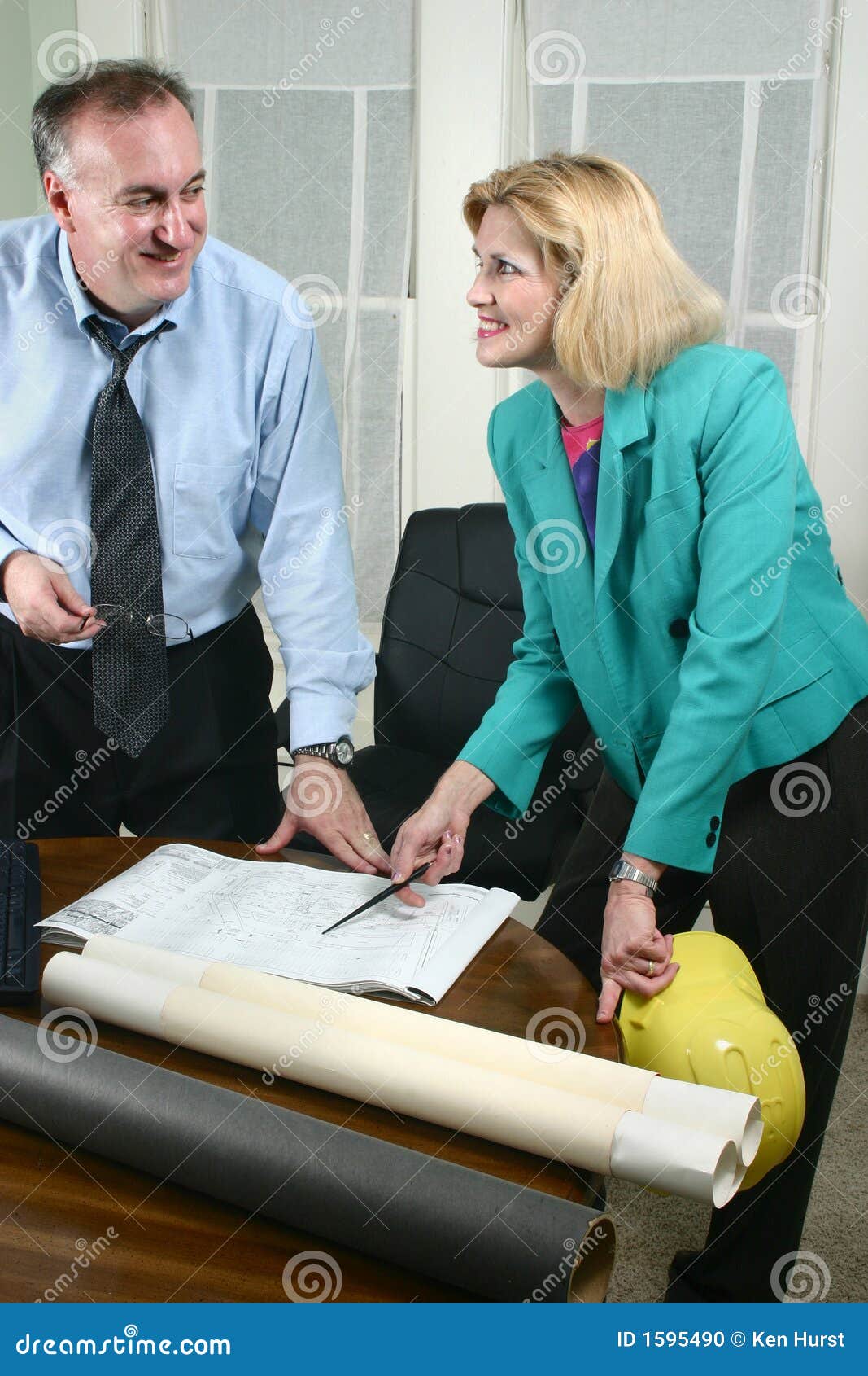 Architect and Client Looking at Blueprints 7 Stock Photo - Image of ...