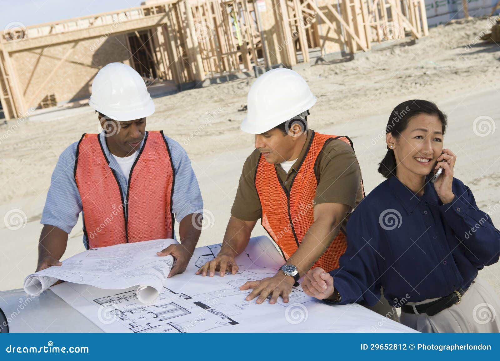 Architect and Co-Workers at Construction Site Stock Photo - Image of ...