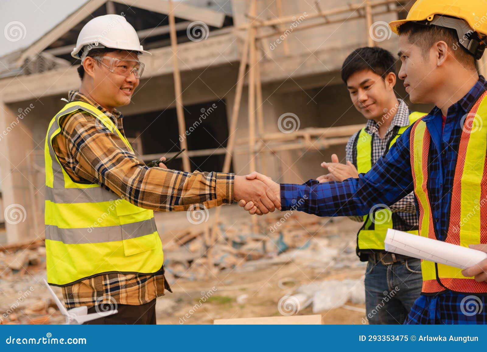 Architect and Construction Engineer Holding Hands while Working for ...