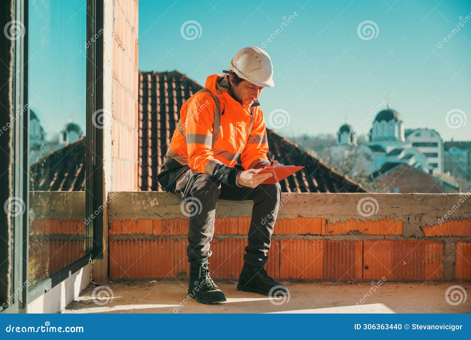 Architect and Construction Engineer Making Notes and Remarks during ...