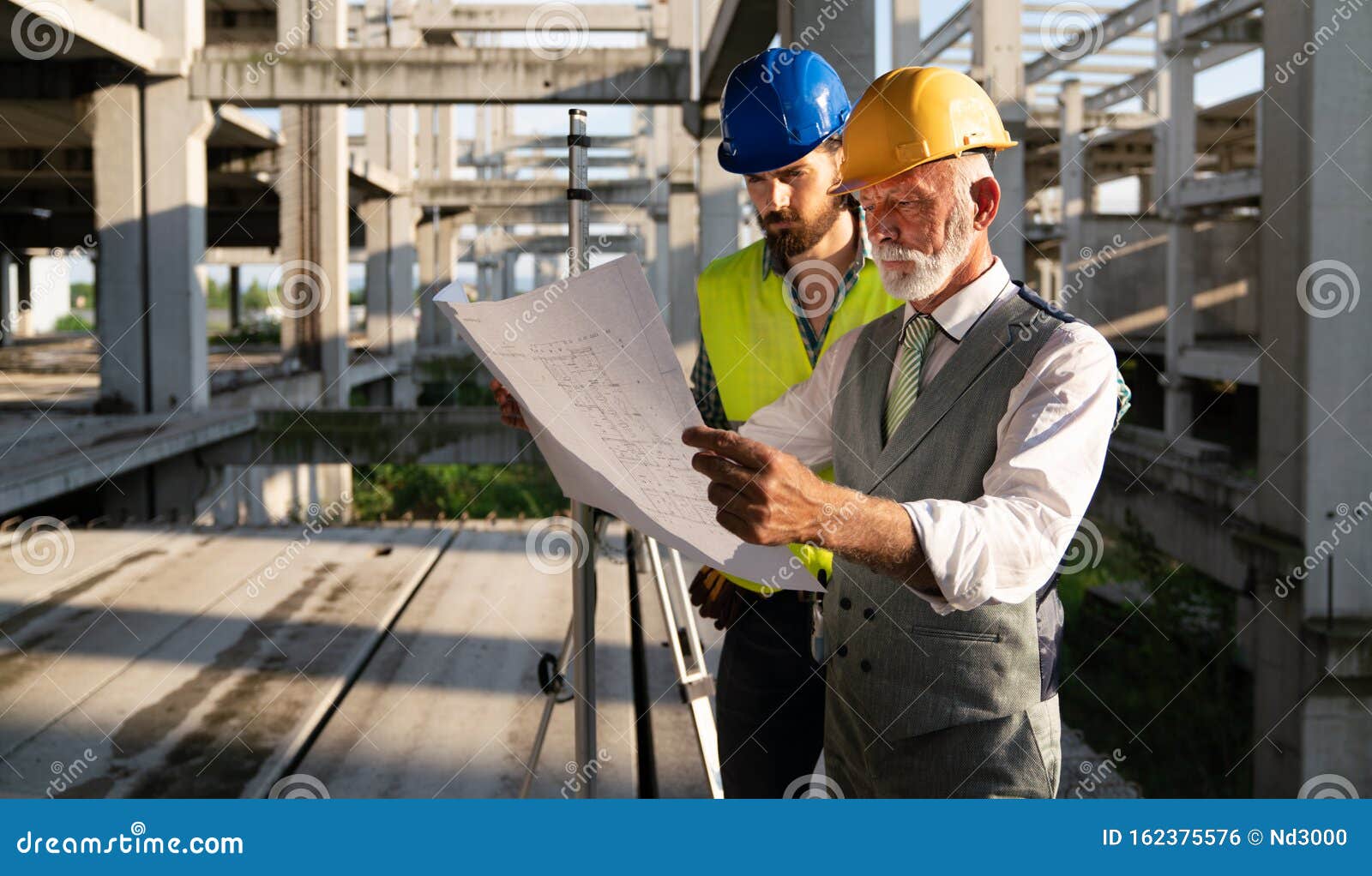 Architect and Construction Engineer or Surveyor Discussion Plans and ...