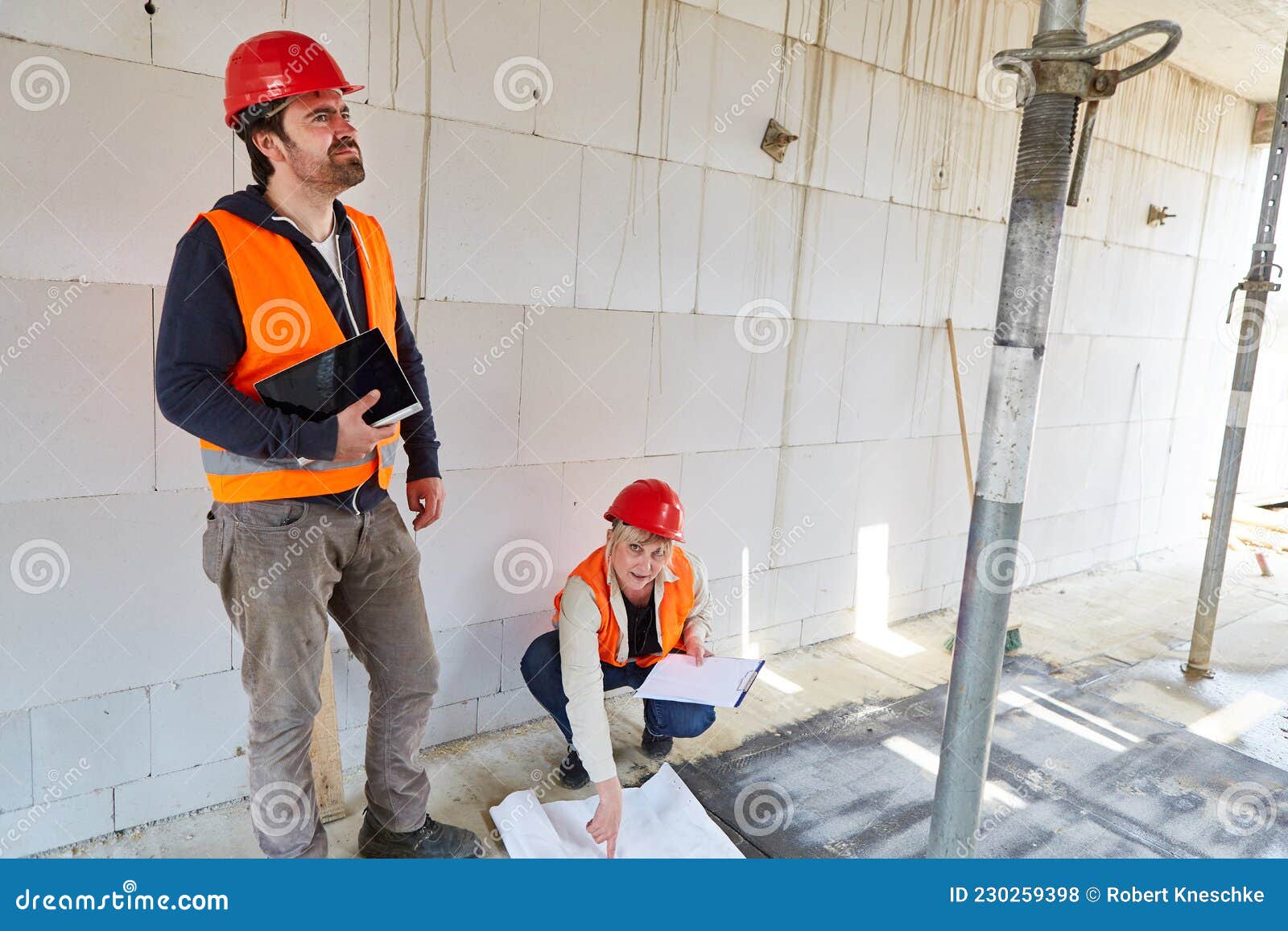 Architect and Construction Expert in the Shell Construction Stock Photo ...