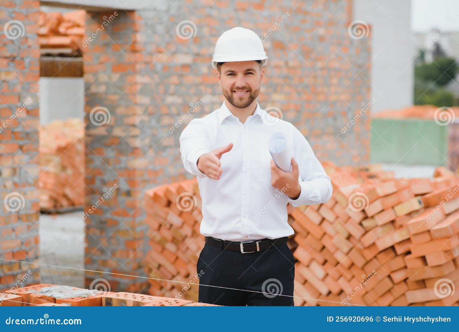 Architect at a Construction Site with Blueprints Stock Photo - Image of ...