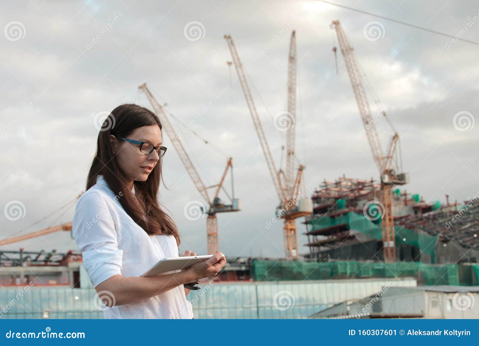 Architect on the Construction Site Makes Supervision. Young Female ...