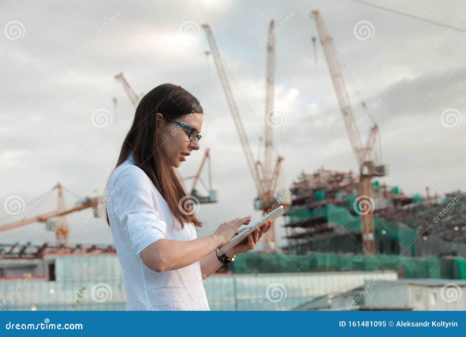 Architect on the Construction Site Makes Supervision. Young Female ...