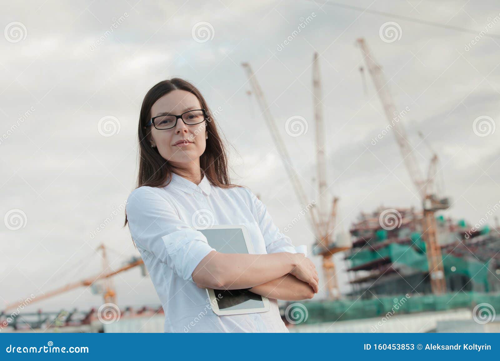 Architect on the Construction Site Makes Supervision. Young Woman ...