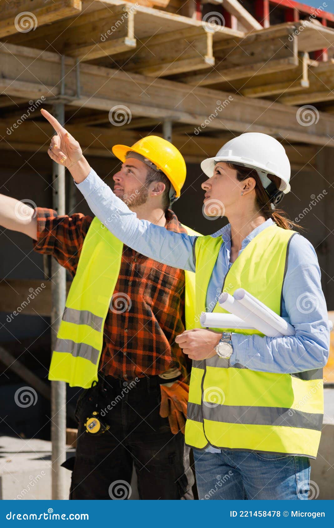 Architect and Construction Worker Stock Photo - Image of businesswoman ...