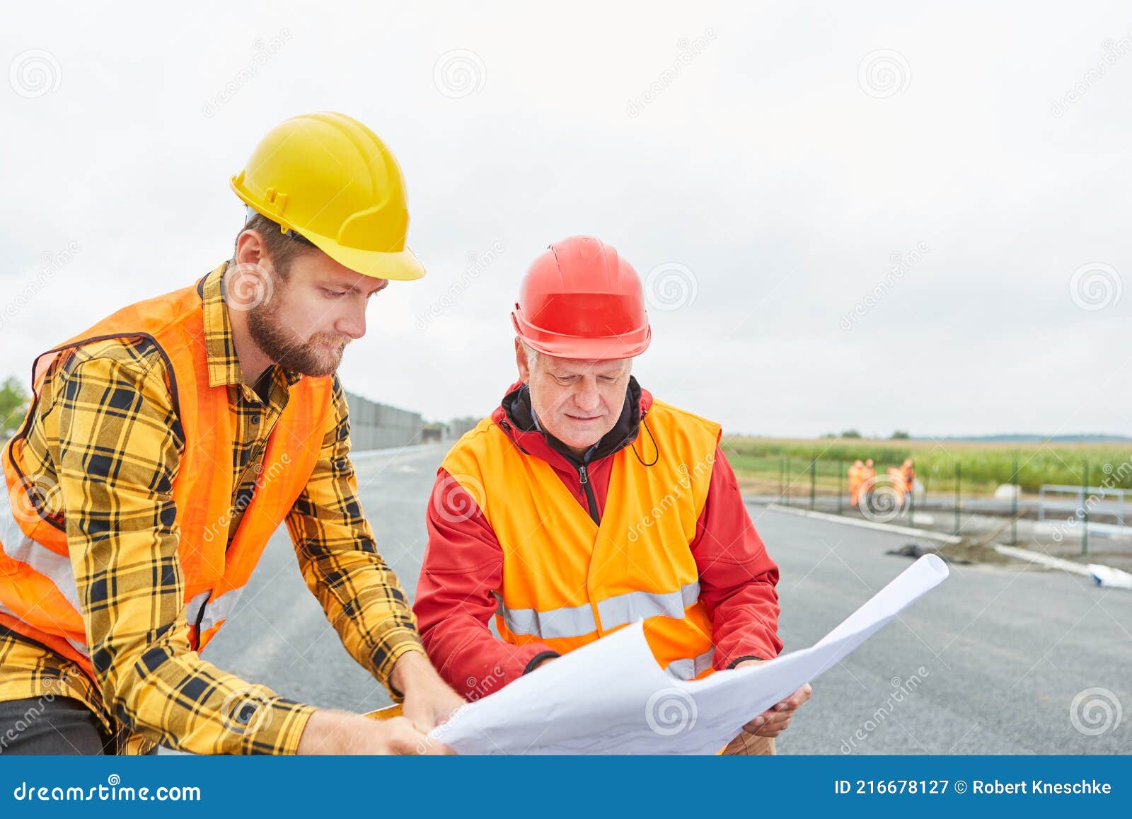 Architect and Construction Worker with Architectural Drawing Stock ...