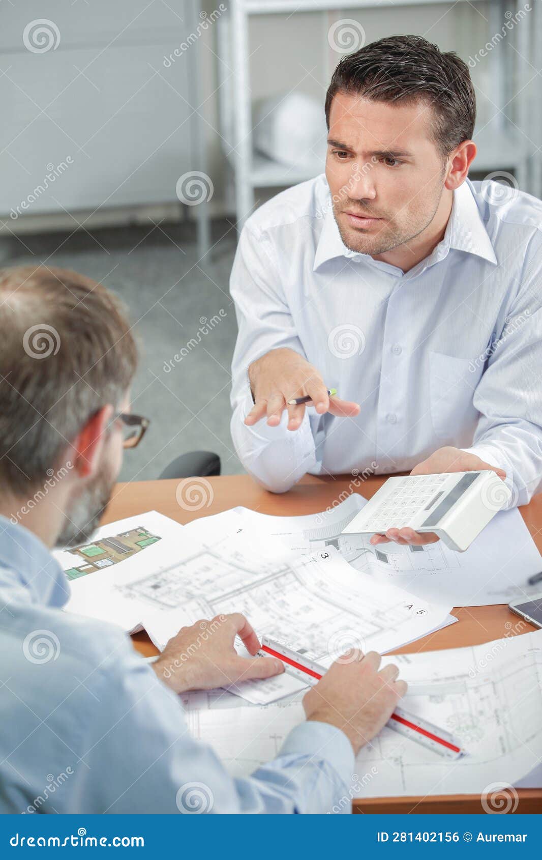 Architect Crunching Numbers during Meeting Stock Photo - Image of ... Architect Crunching Numbers during Meeting Stock Photo - Image of ...