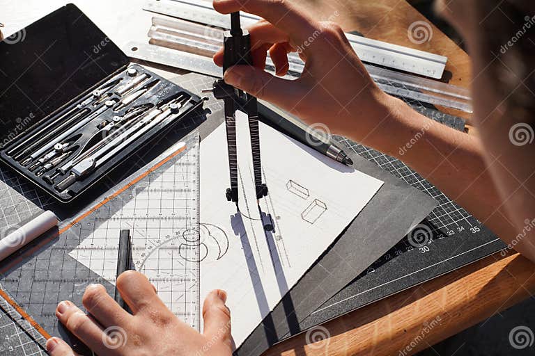 Architect and Designer Working Accurately on a Project Drawing Sketches ...