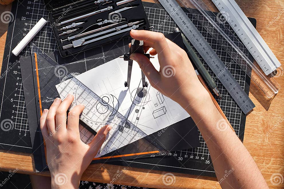 Architect and Designer Working Accurately on a Project Drawing Sketches ...