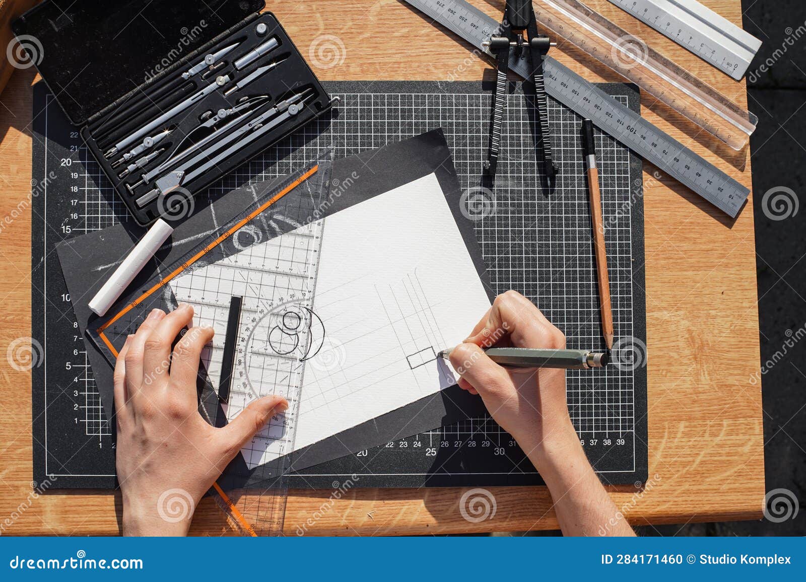 Architect and Designer Working Accurately on a Project Drawing Sketches ...