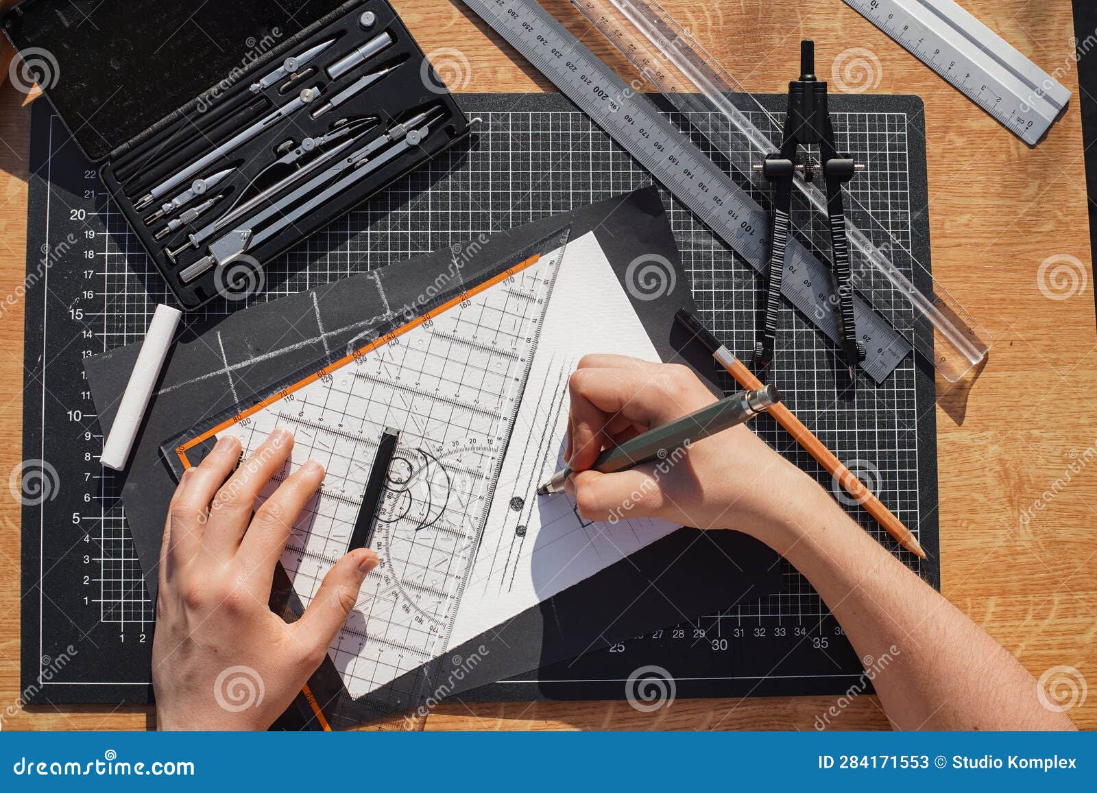 Architect and Designer Working Accurately on a Project Drawing Sketches ...