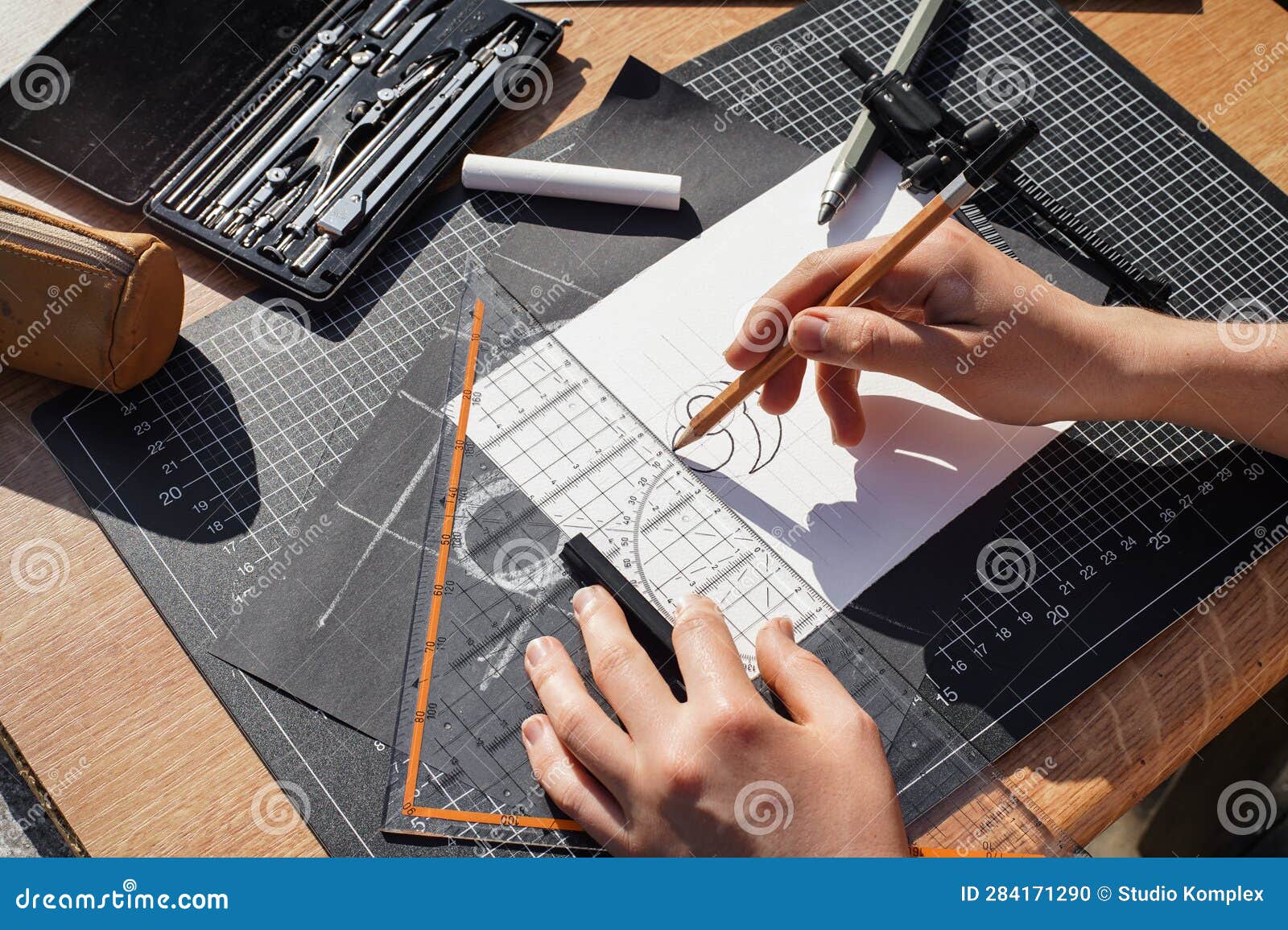 Architect and Designer Working Accurately on a Project Drawing Sketches ...