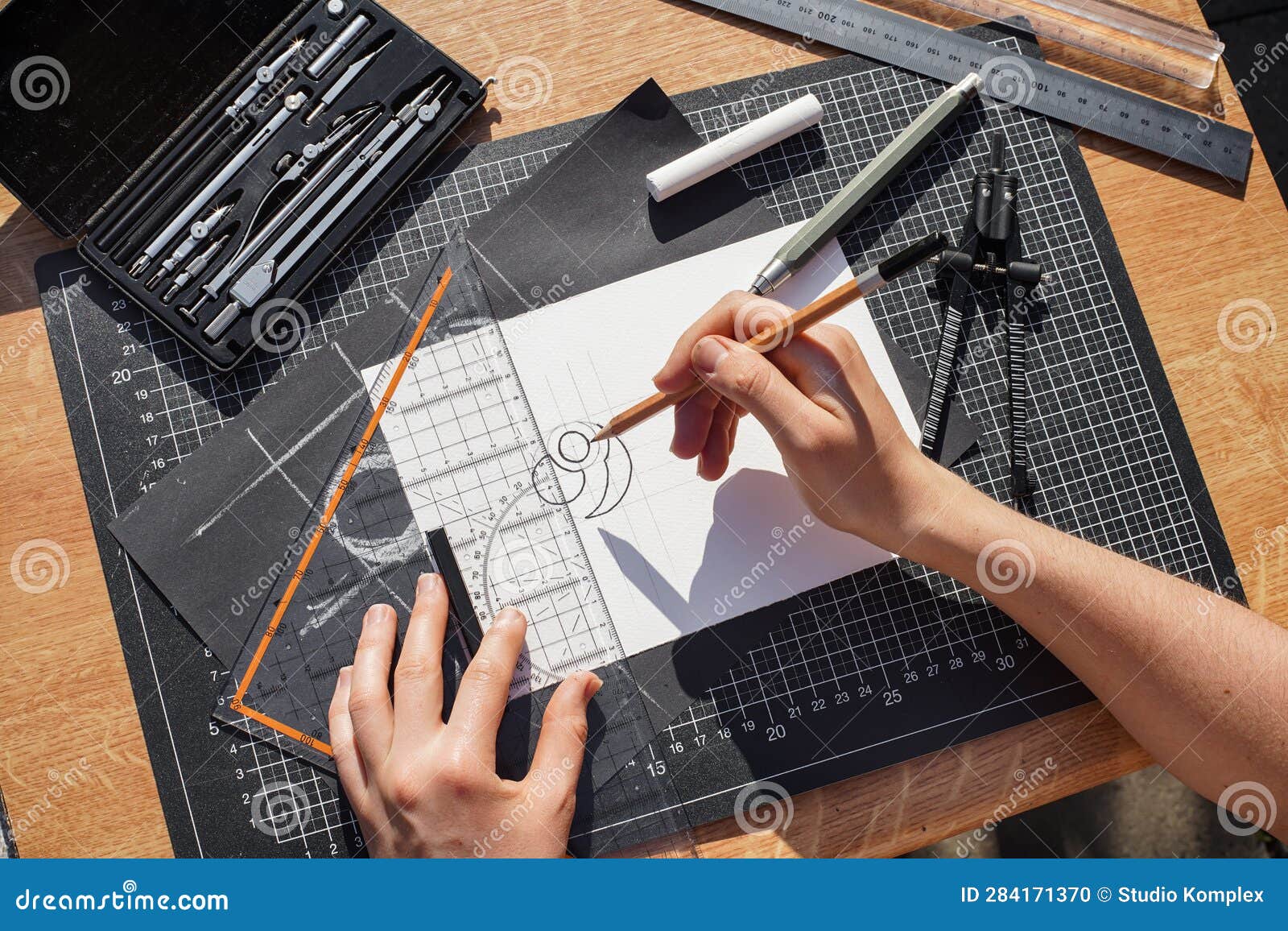 Architect and Designer Working Accurately on a Project Drawing Sketches ...