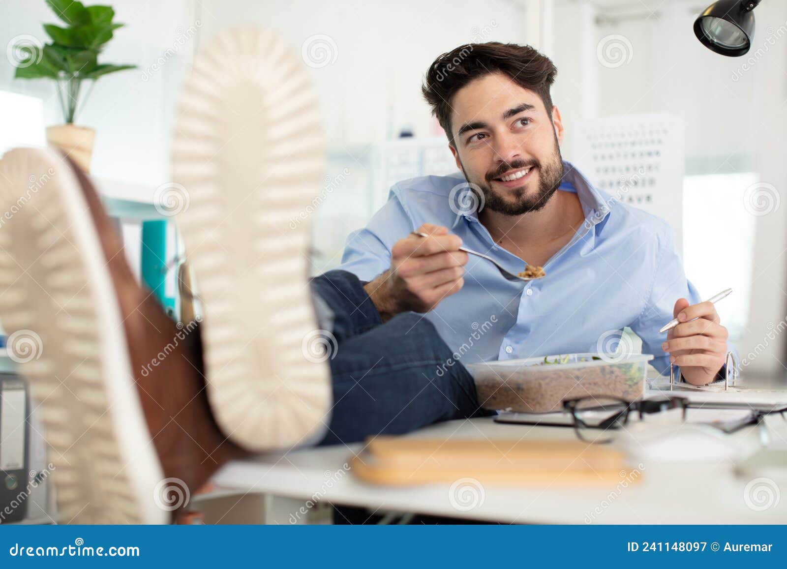 Architect Designing with Computer Feet Up on Desk Stock Image - Image ...