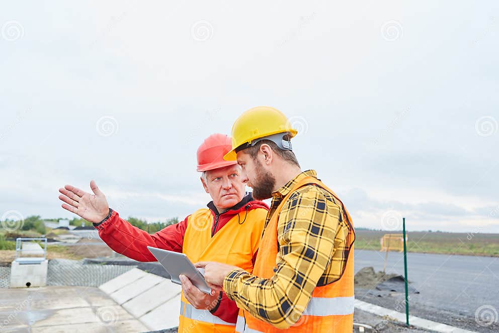 Architect Discusses Road Construction Planning with Foreman Stock Image ...