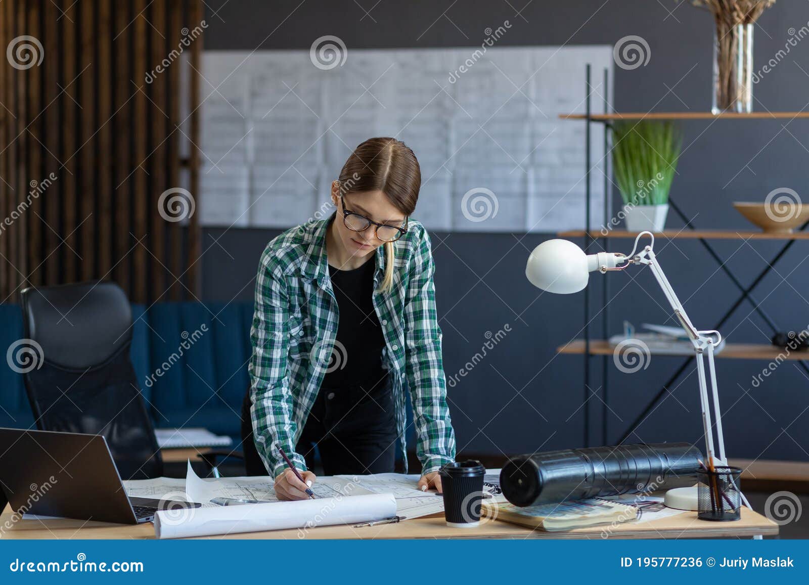 Architect Drawing Blueprints in Office. Engineer Sketching a ...