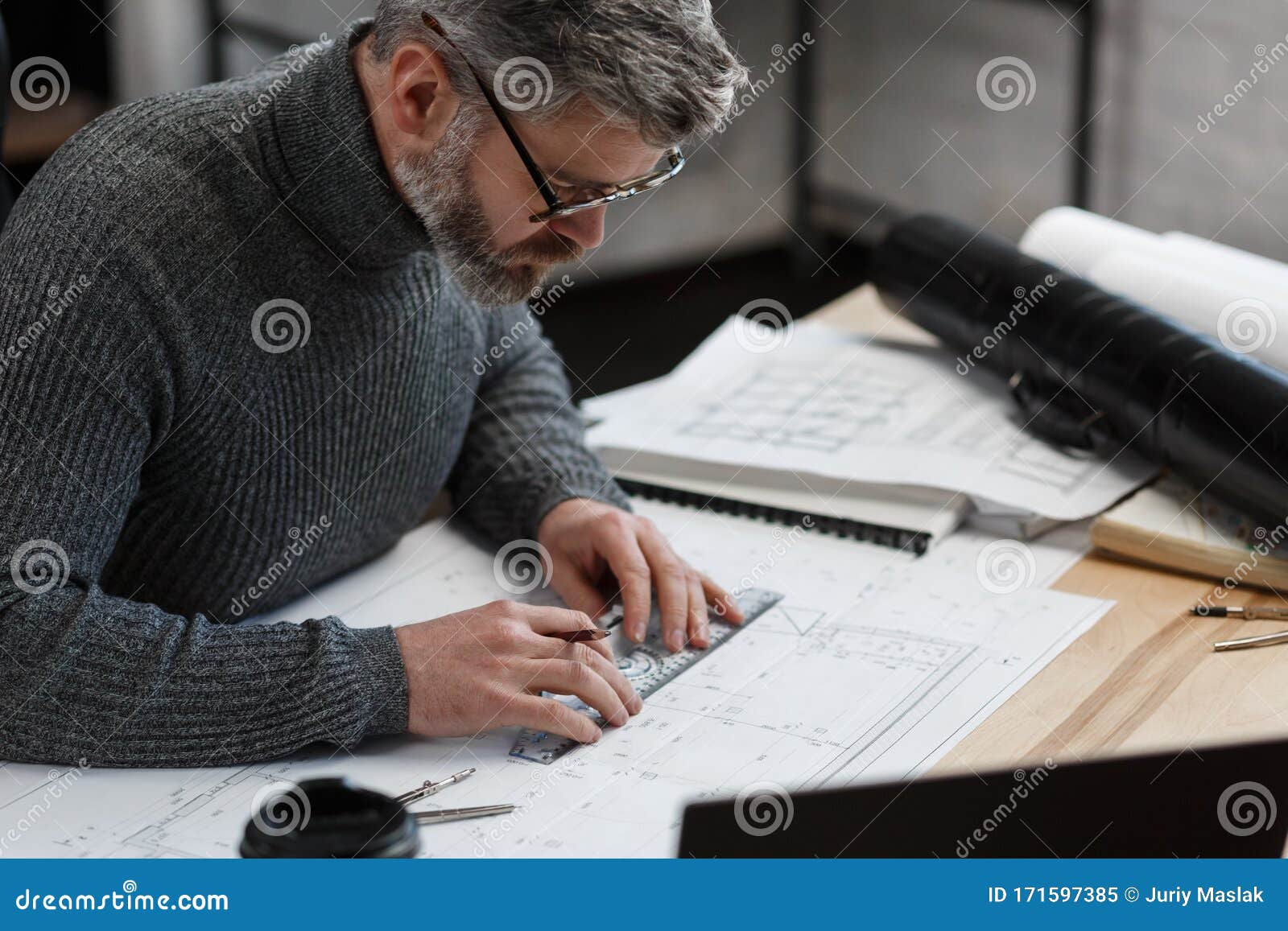 Architect Drawing Blueprints in Office. Engineer Sketching a ...