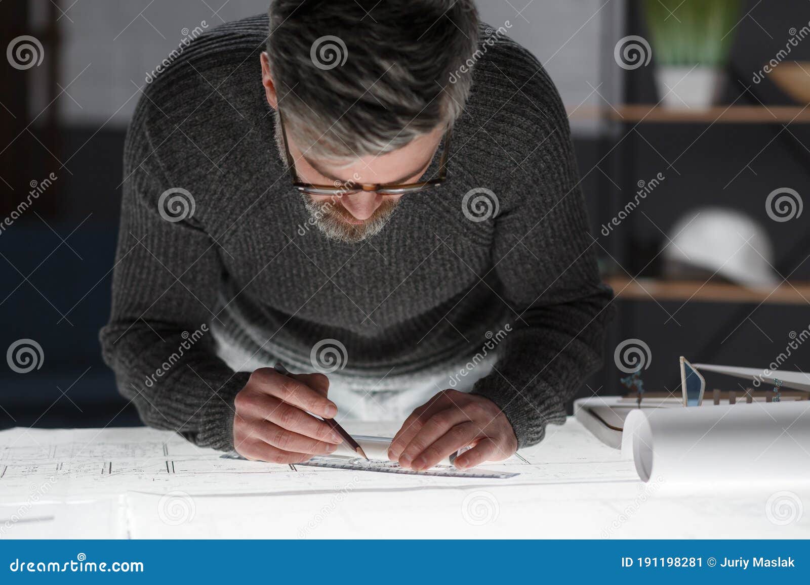 Architect Drawing Blueprints in Office. Engineer Sketching a ...