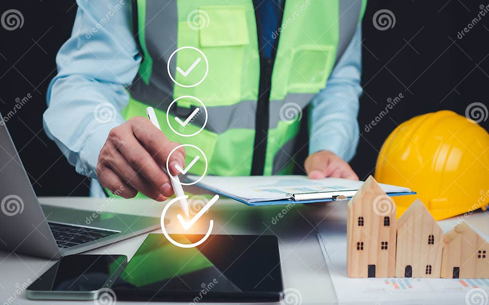 Architect or Engineer Checking the List of Documents and Approving the ...