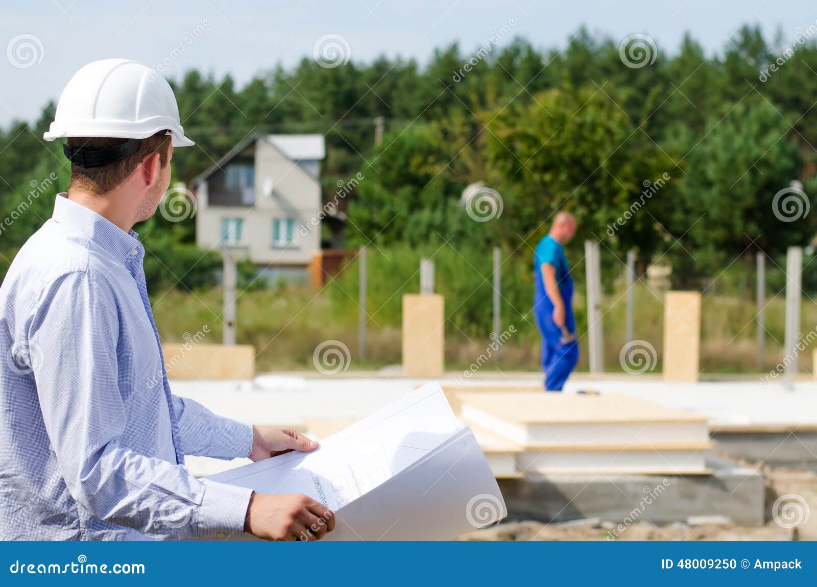 Architect or Engineer Checking Plans on Site Stock Photo - Image of ...
