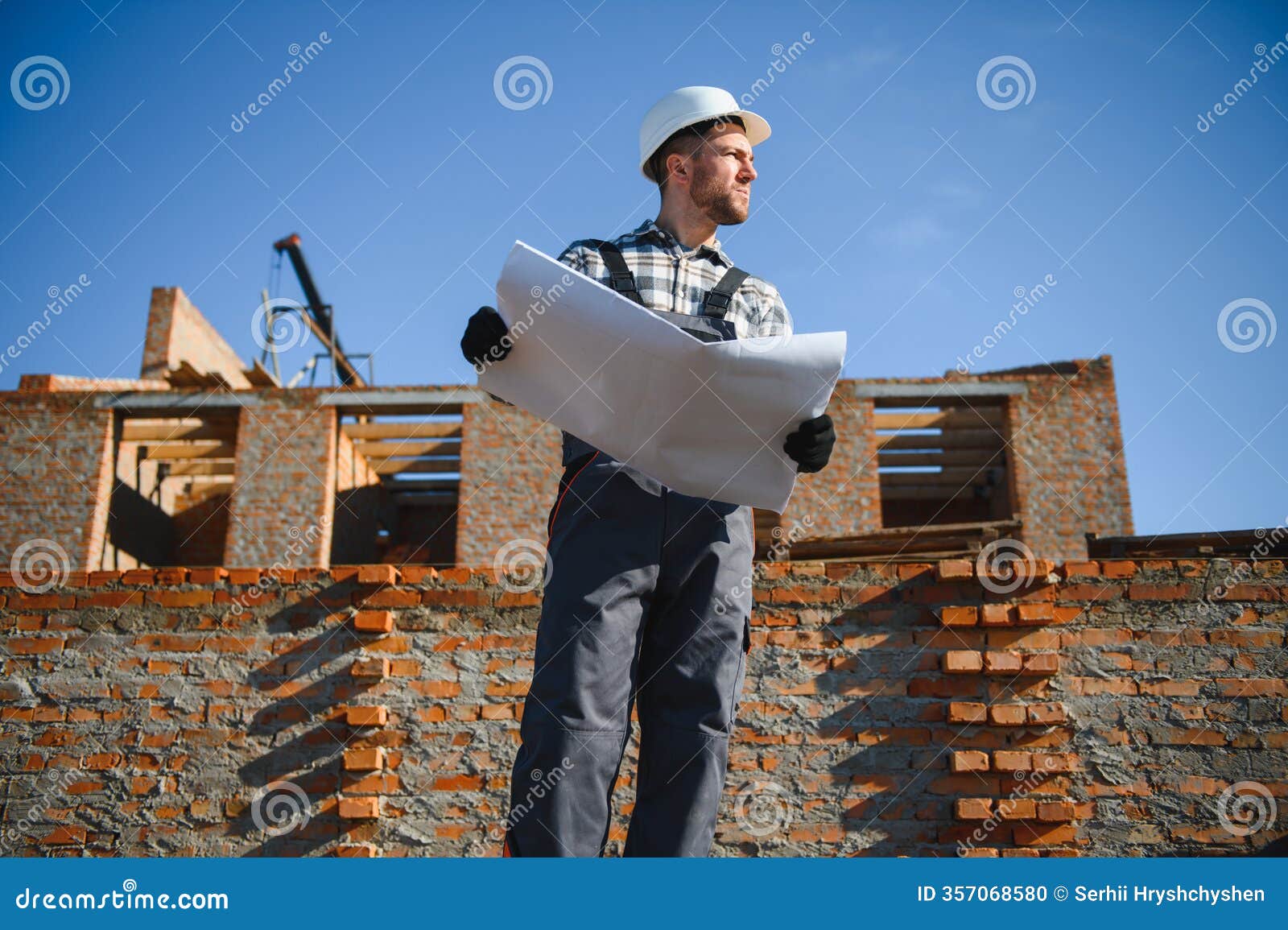 An Architect or Engineer on the Construction of Brick Houses Holds the ...