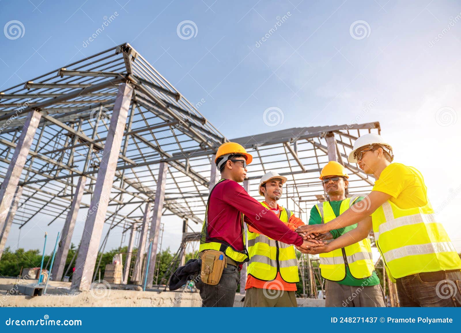 Architect and Engineer Construction Workers Join Hands while Working at ...