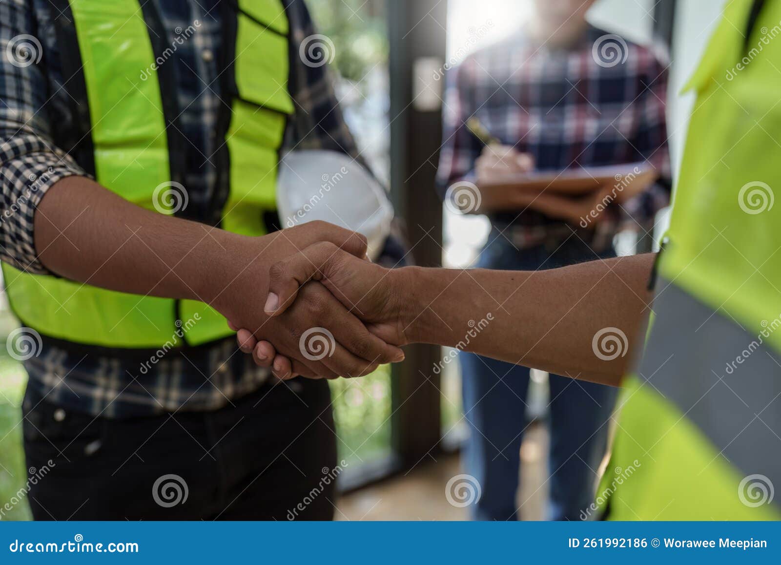 Architect and Engineer Construction Workers Shaking Hands after Finish ...