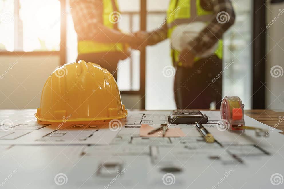 Architect and Engineer Construction Workers Shaking Hands after Finish ...