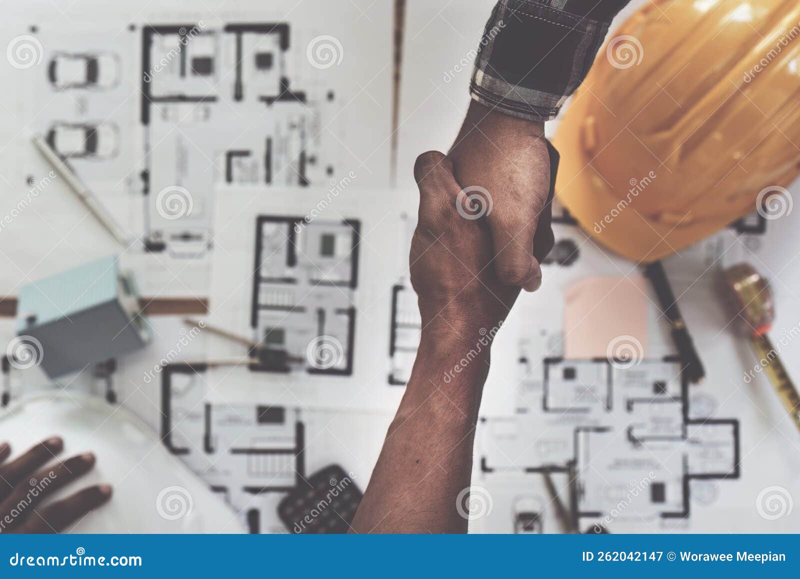 Architect and Engineer Construction Workers Shaking Hands after Finish ...
