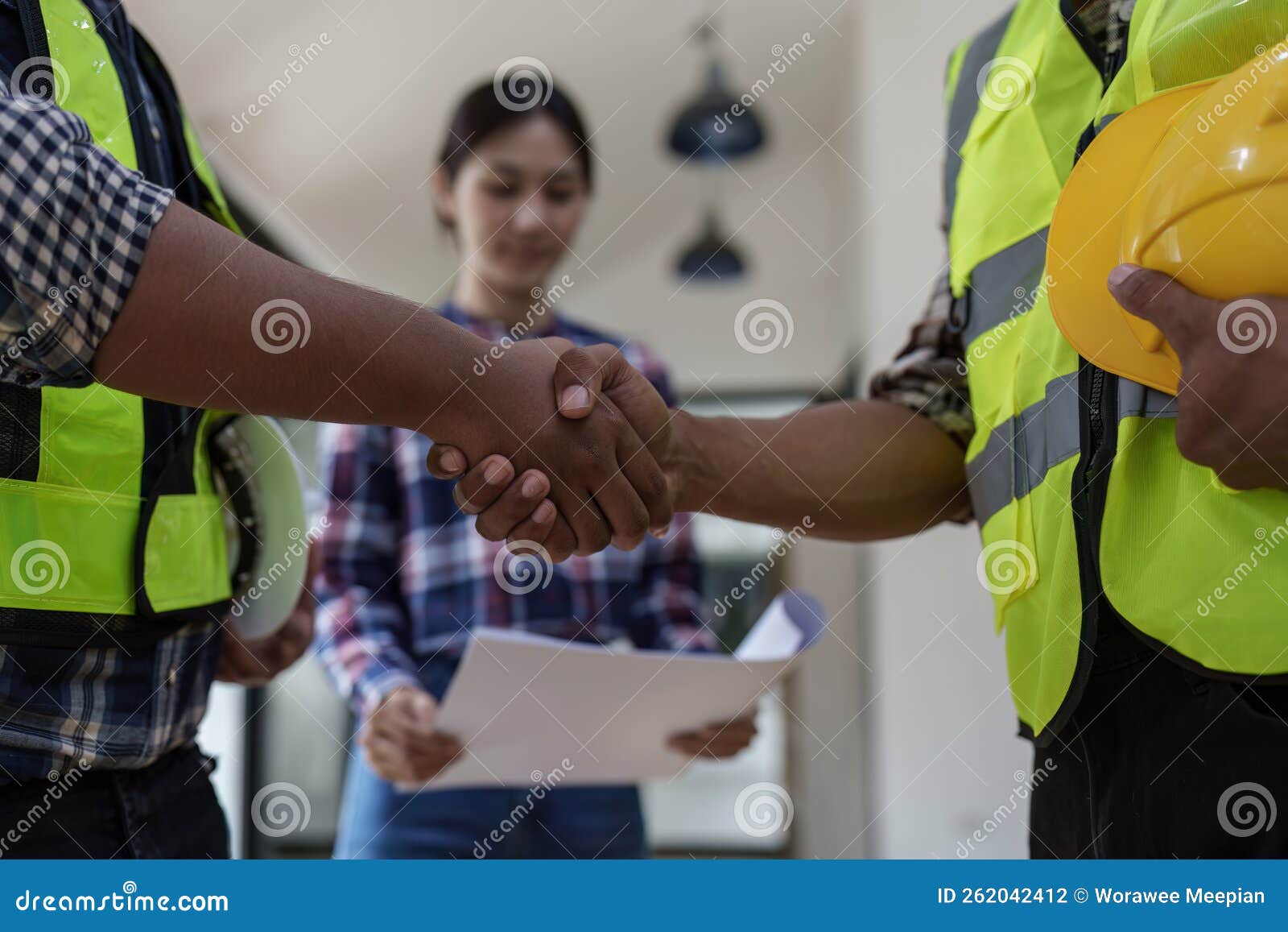 Architect and Engineer Construction Workers Shaking Hands after Finish ...