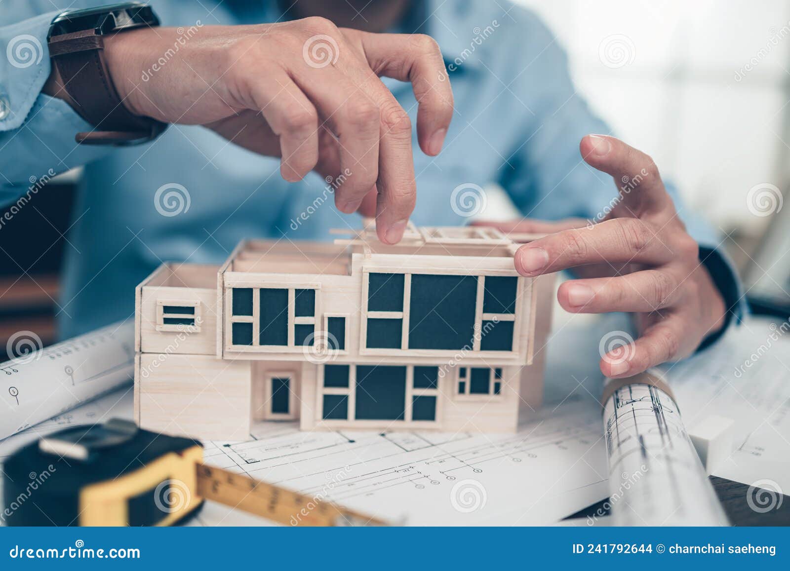 Architect Engineer Design House Model on Blueprint. House Planning ...