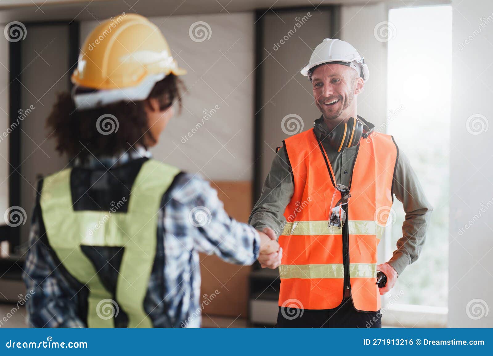 Architect or Engineer and Foreman Construction Workers Shaking Hands ...