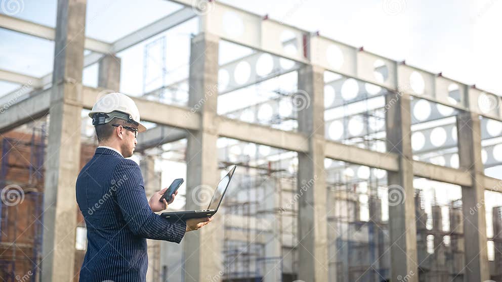 An Architect Engineer Inspecting the Building Construction and Check ...