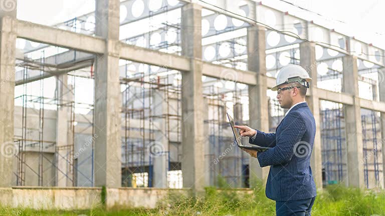 An Architect Engineer Inspecting the Building Construction and Check ...