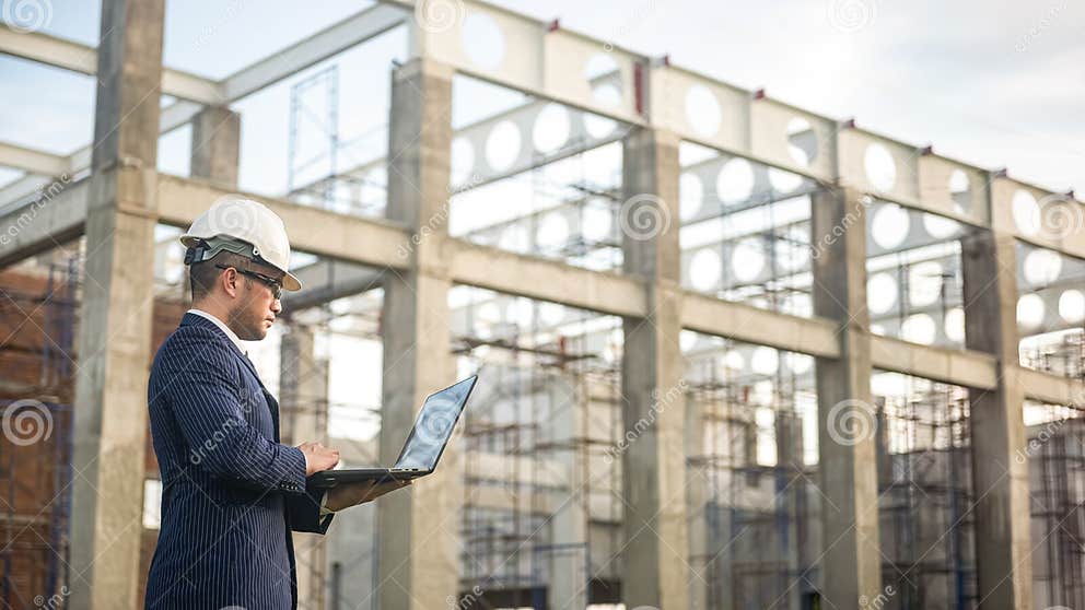 An Architect Engineer Inspecting the Building Construction and Check ...