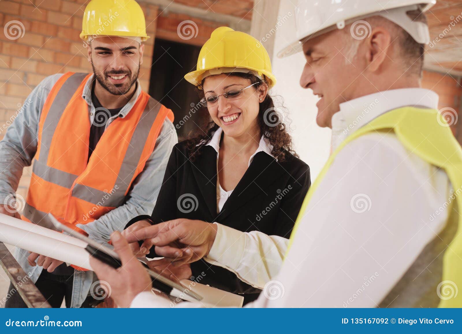 Architect Engineer and Manual Worker Meeting in Construction Site Stock ...