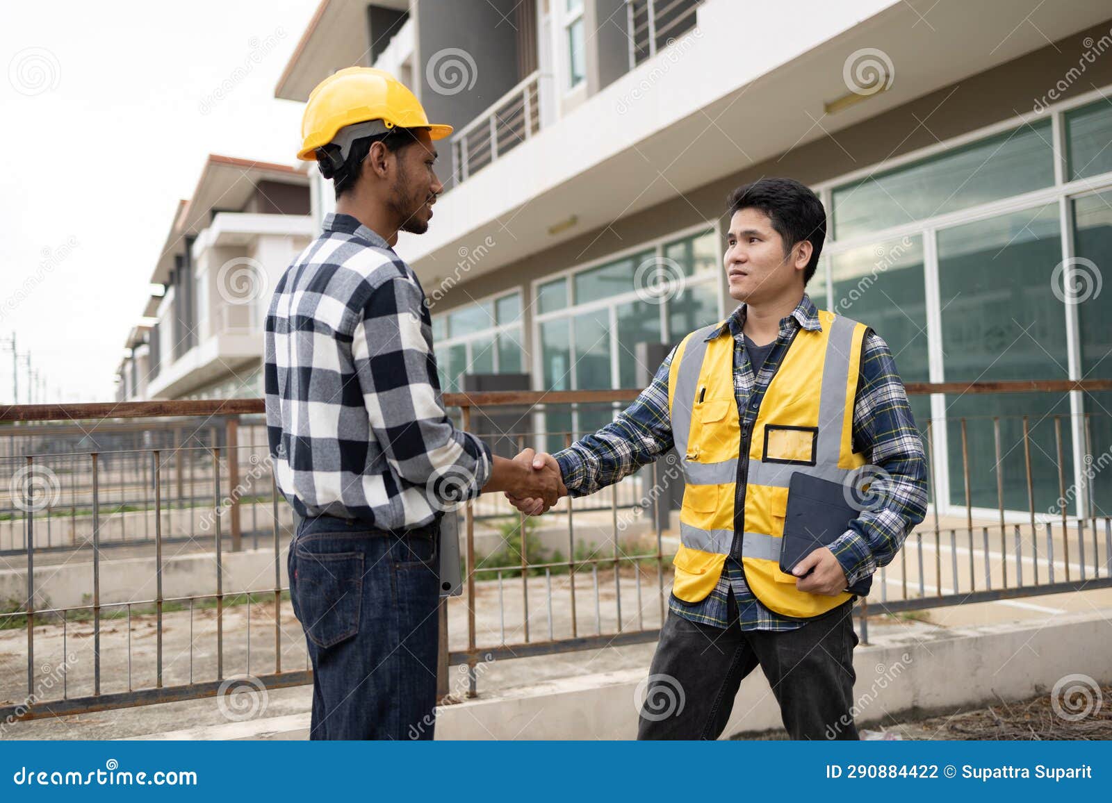 Architect and Engineer Shaking Hands at Job Site, the Project ...