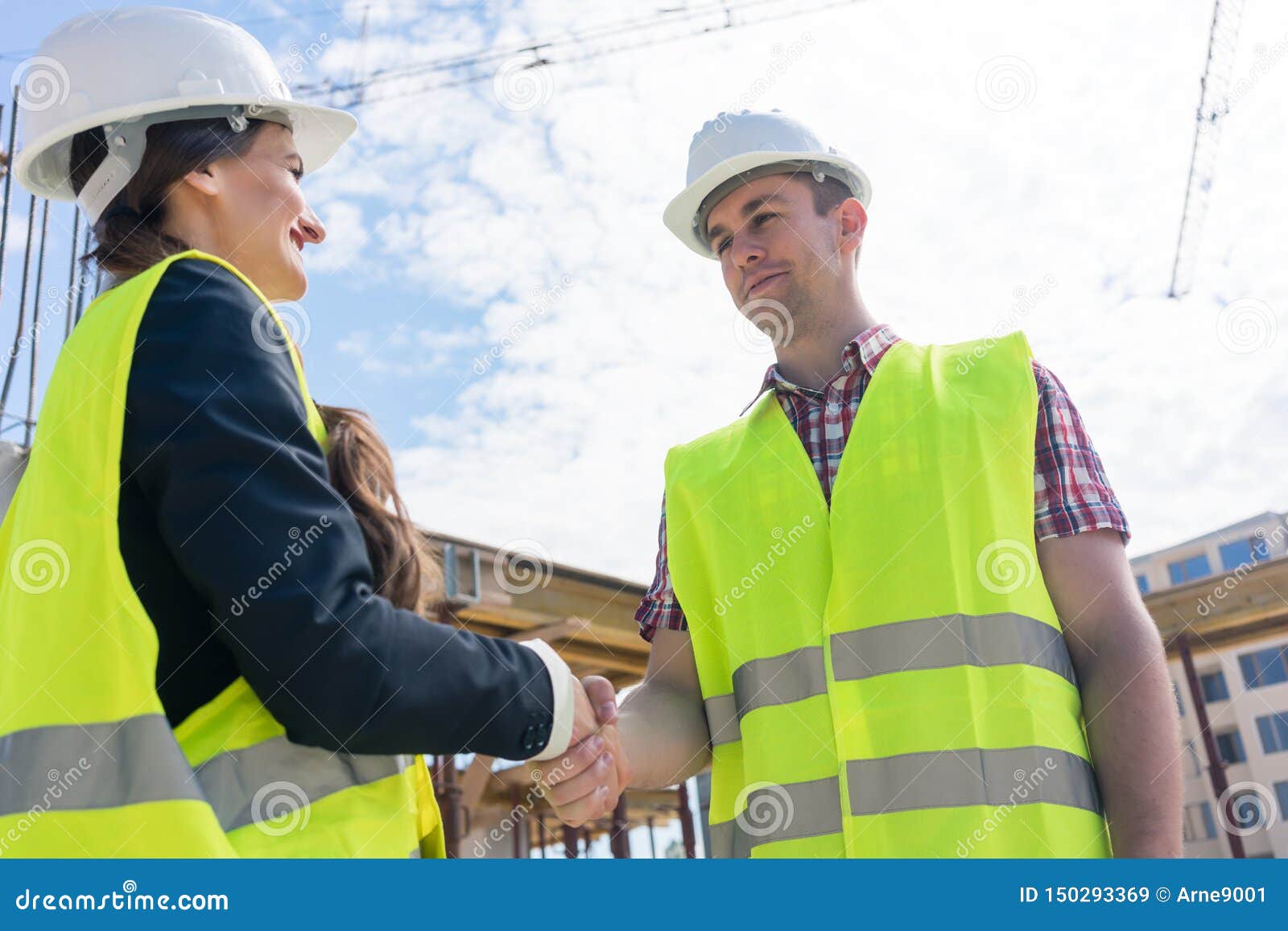 Architect and Engineer or Supervisor Shaking Hands on the Construction ...