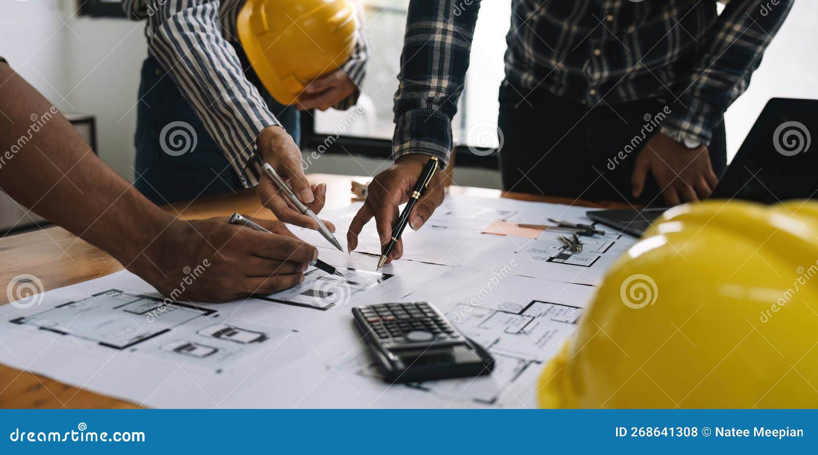 Architect and Engineer Team Working with Blueprints for Architectural ...