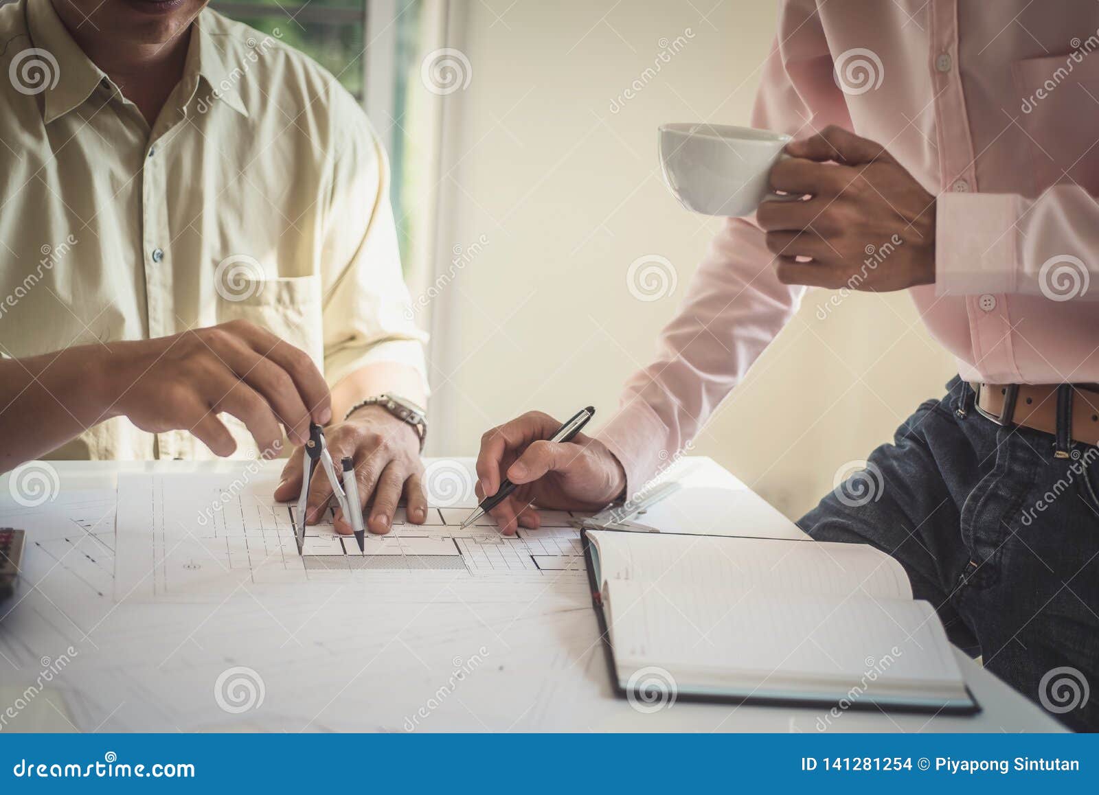 Architect or Engineer Team Working with Blueprints Building Plan Design ...