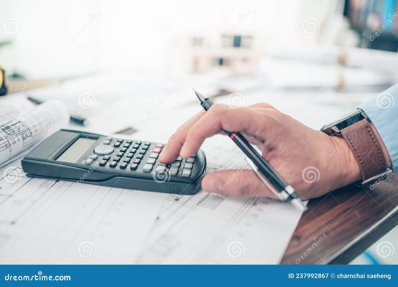 Architect Engineer Use Calculator for Calculate Drawing Design Working ...