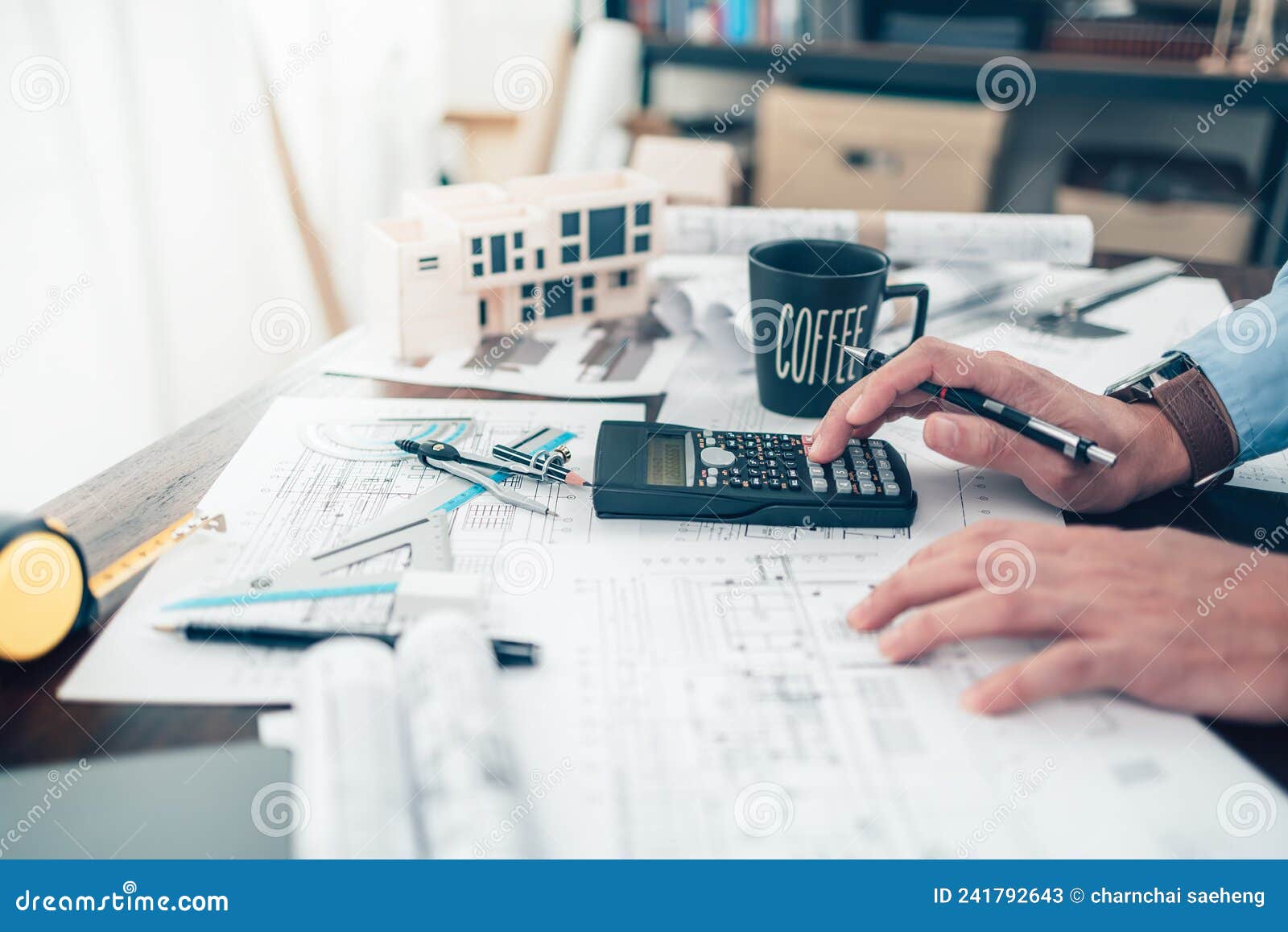 Architect Engineer Use Calculator for Calculate Drawing Design Working ...