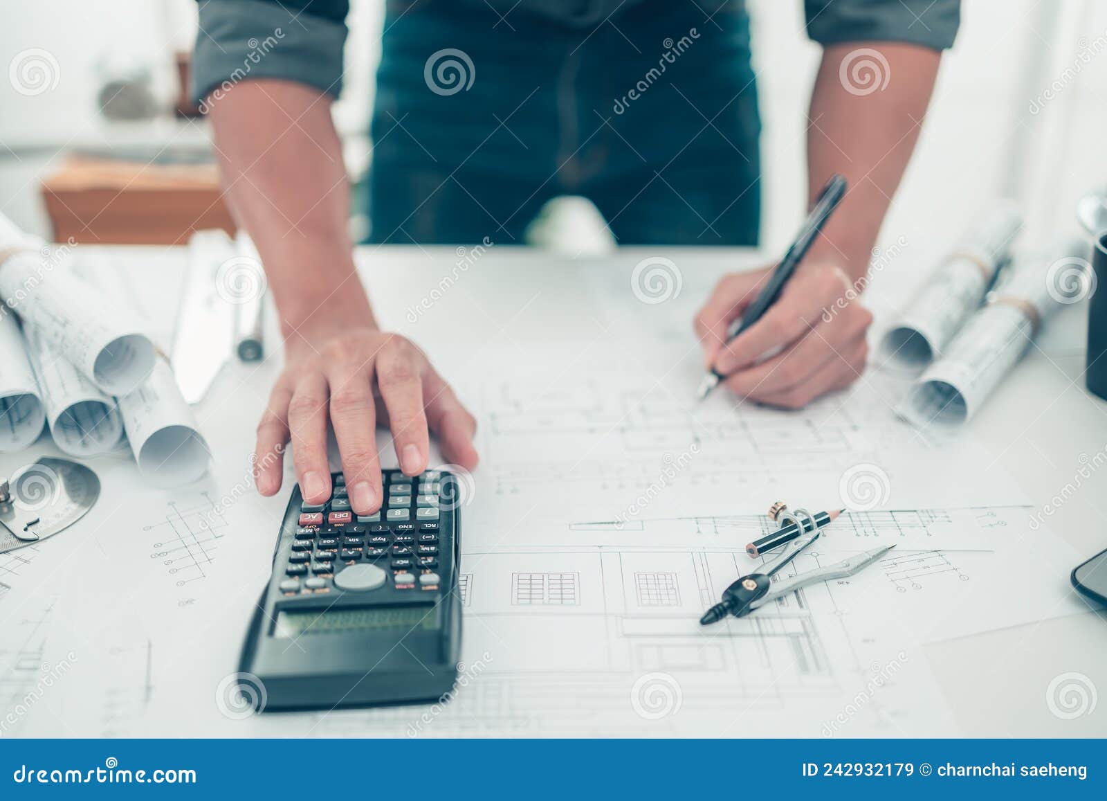 Architect Engineer Use Calculator for Calculate Drawing Design Working ...