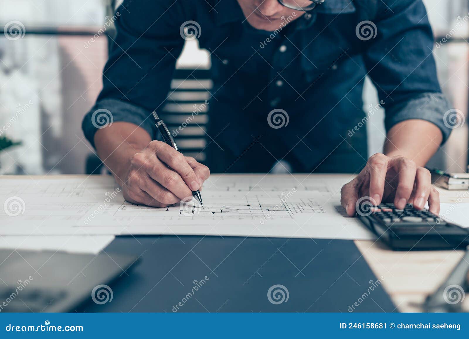 Architect Engineer Use Calculator for Calculate Drawing Design Working ...